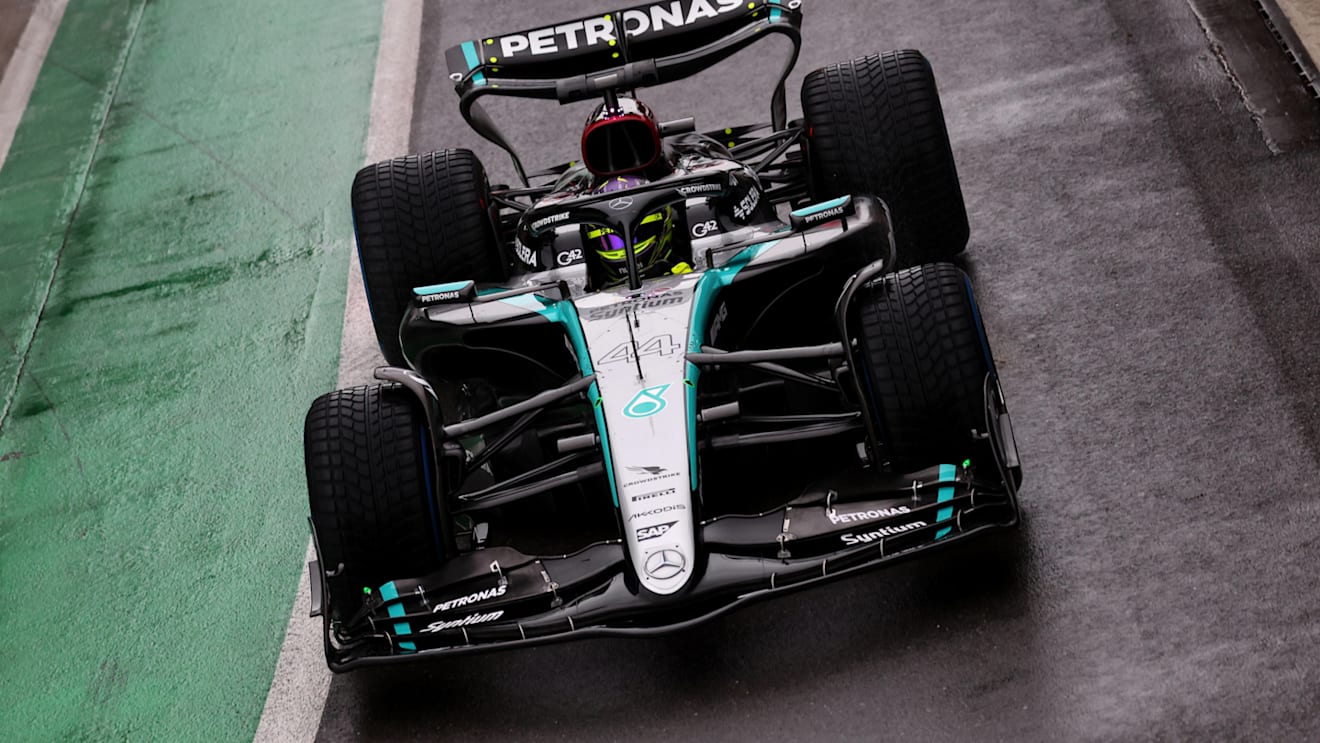 Mercedes' W15 hits the track for the first time at a wet Silverstone with Lewis Hamilton and ...